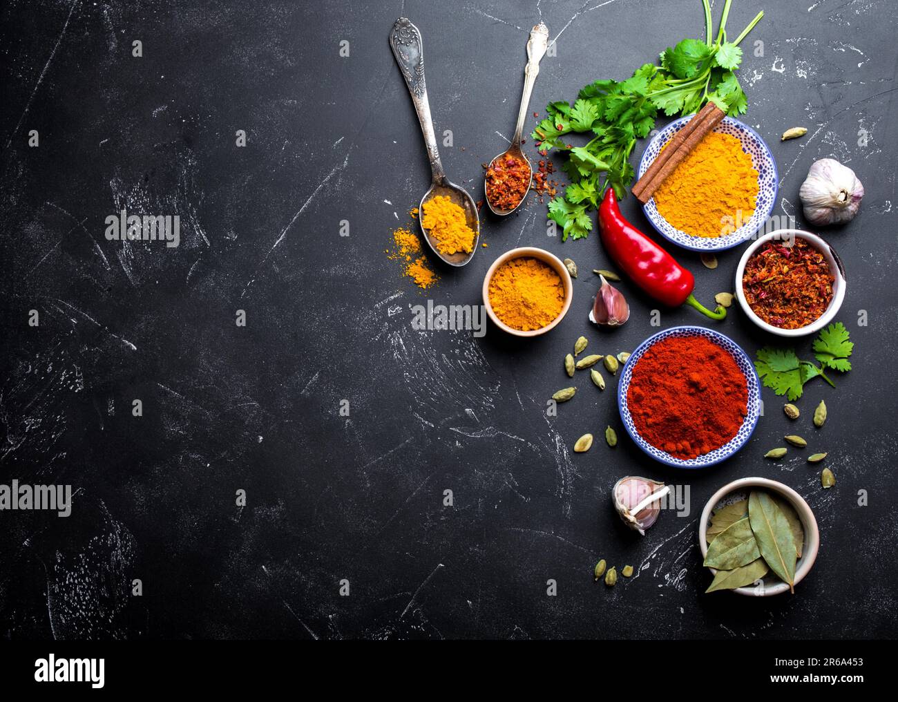 Indian food cooking background. Traditional Indian spices and ...