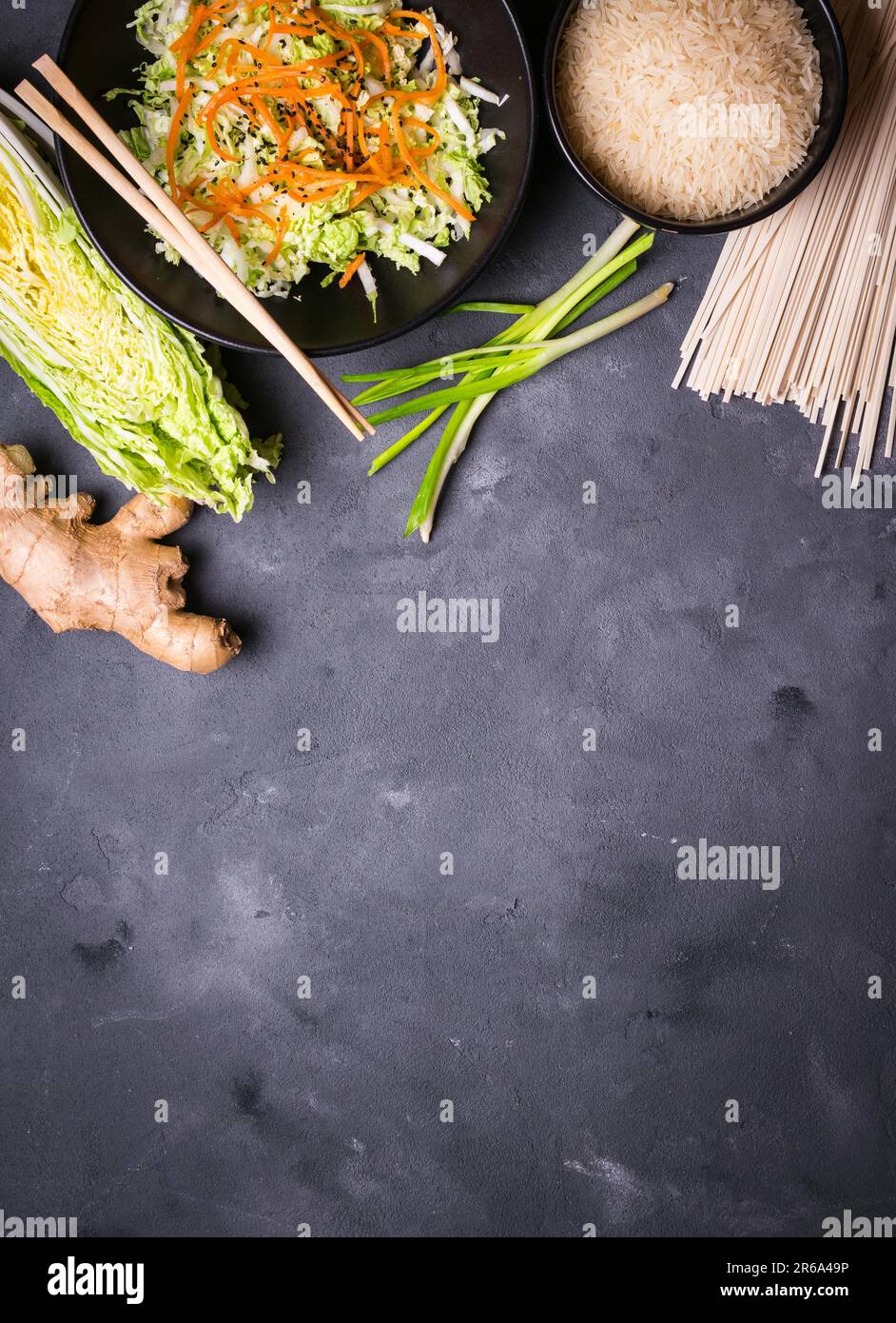 Ingredients for making chinese dinner: wheat noodles, rice, napa ...