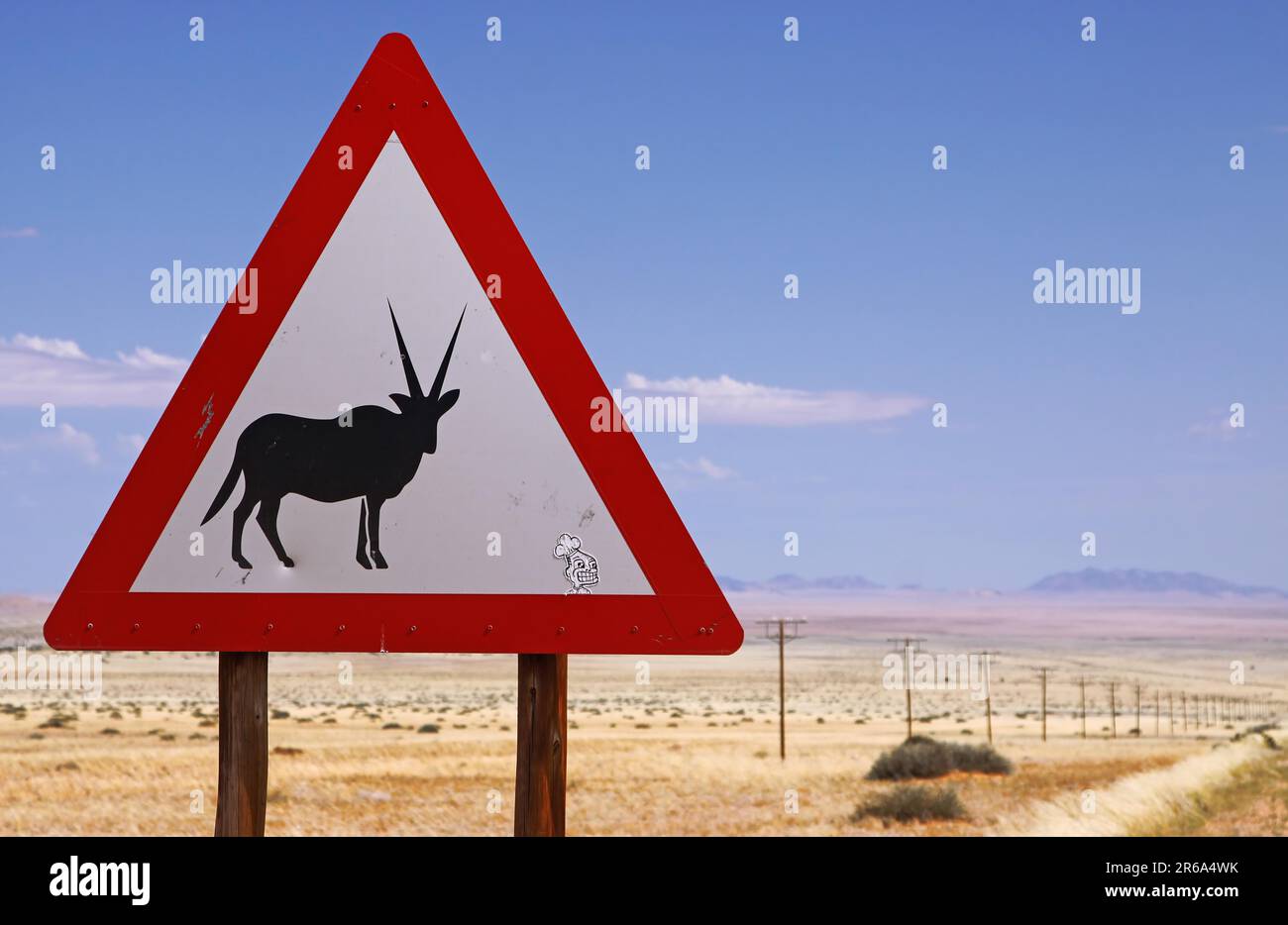 Warning sign deer crossing in Namibia, signpost at a street in Namibia ...