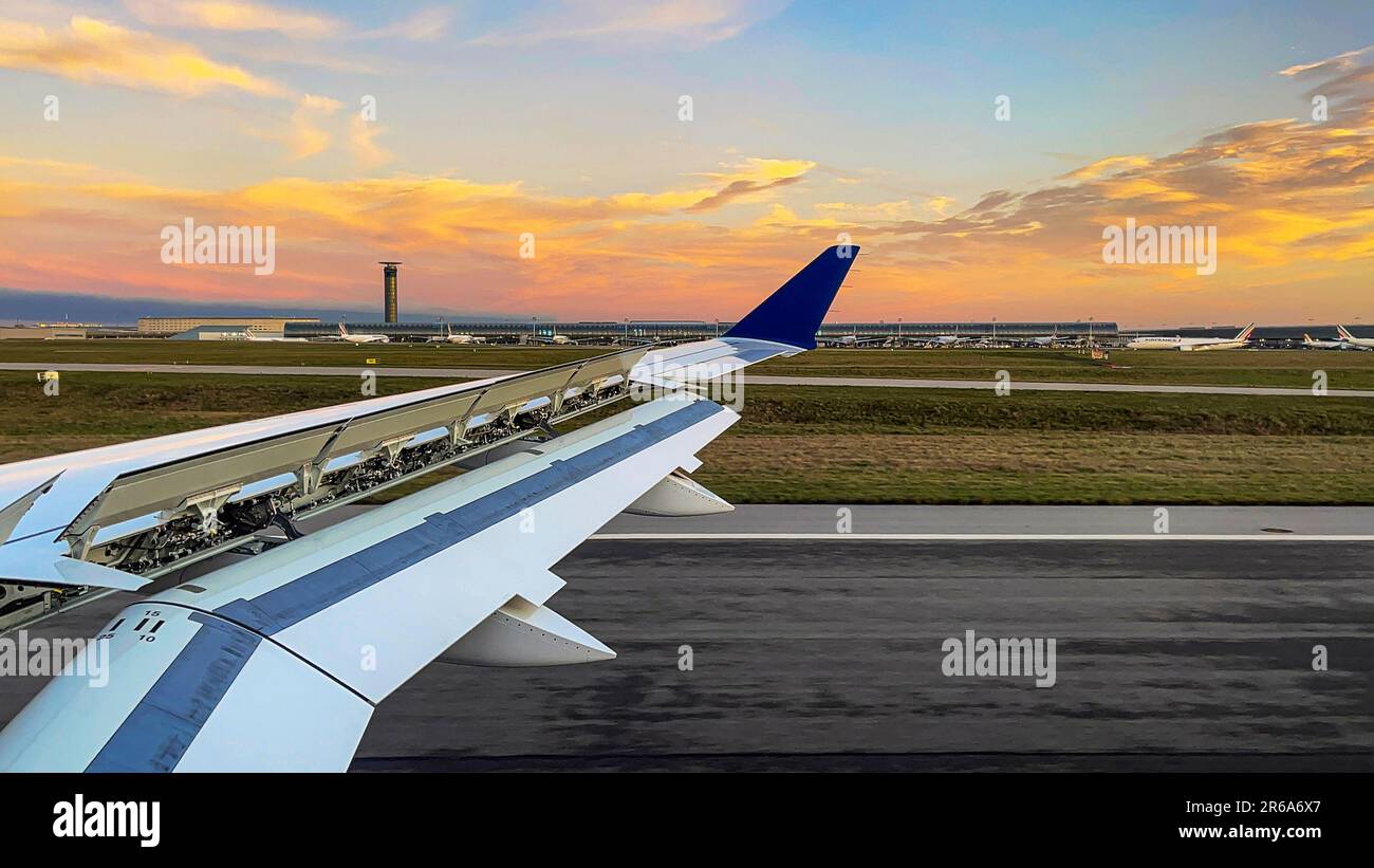 Wing of an aircraft with flaps extended and aerodynamic brakes braking ...