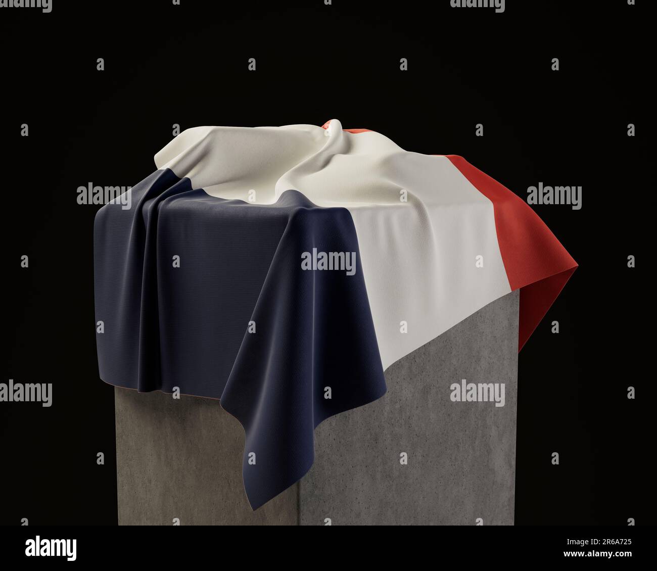 A france flag draped over a stone plinth on an isolated dark studio ...