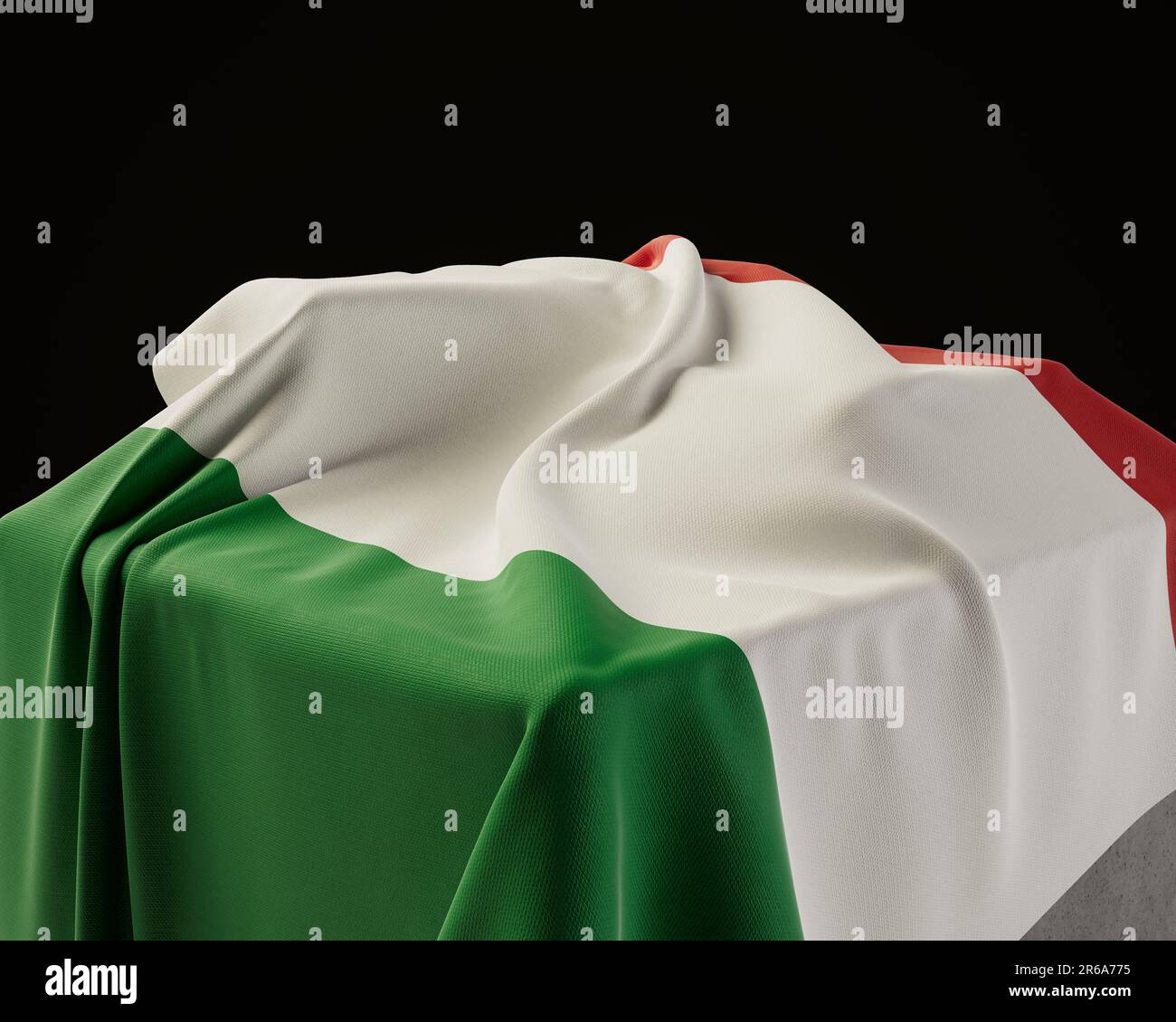 A italy flag draped over a stone plinth on an isolated dark studio ...