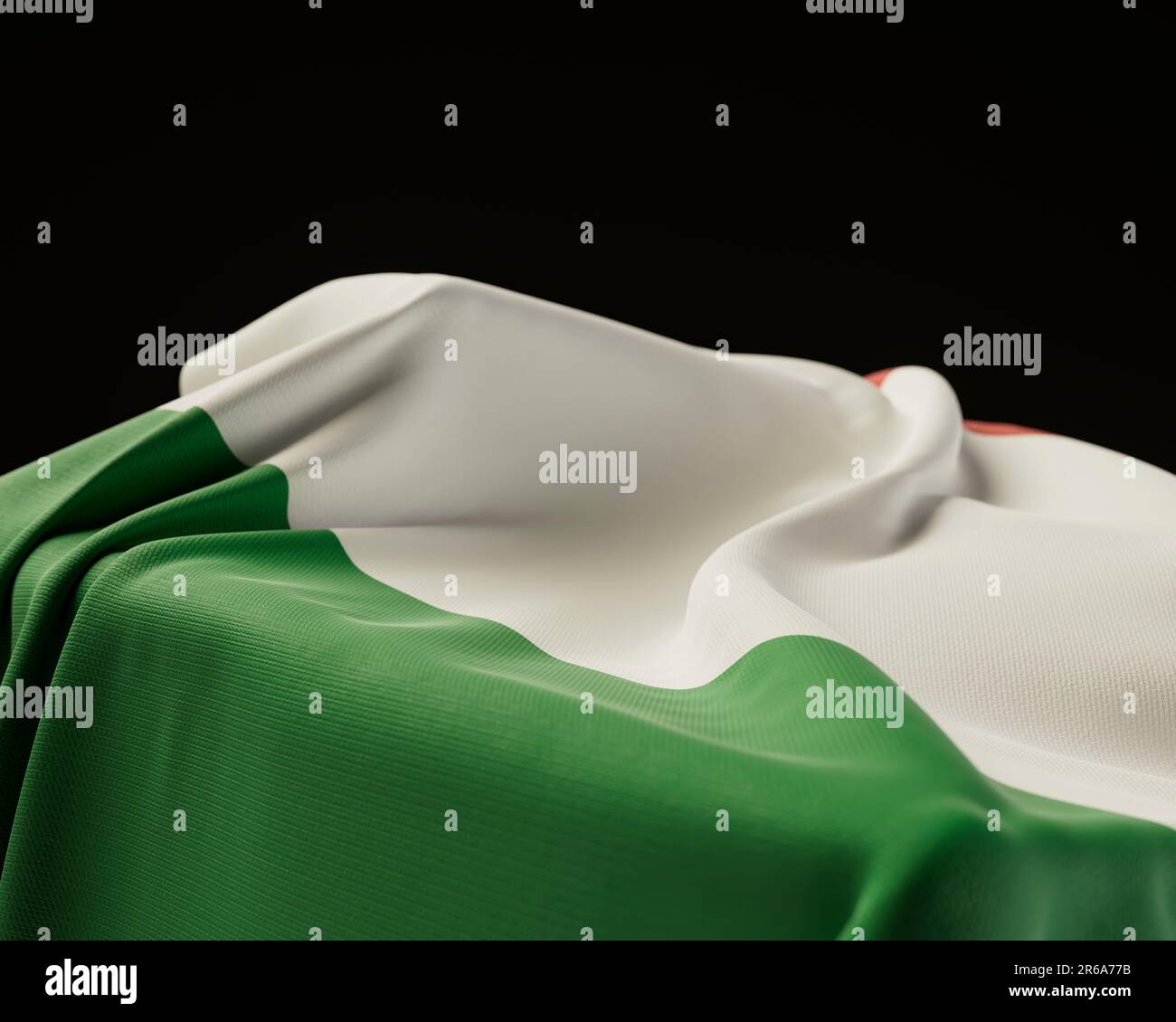 A italy flag draped over a stone plinth on an isolated dark studio ...