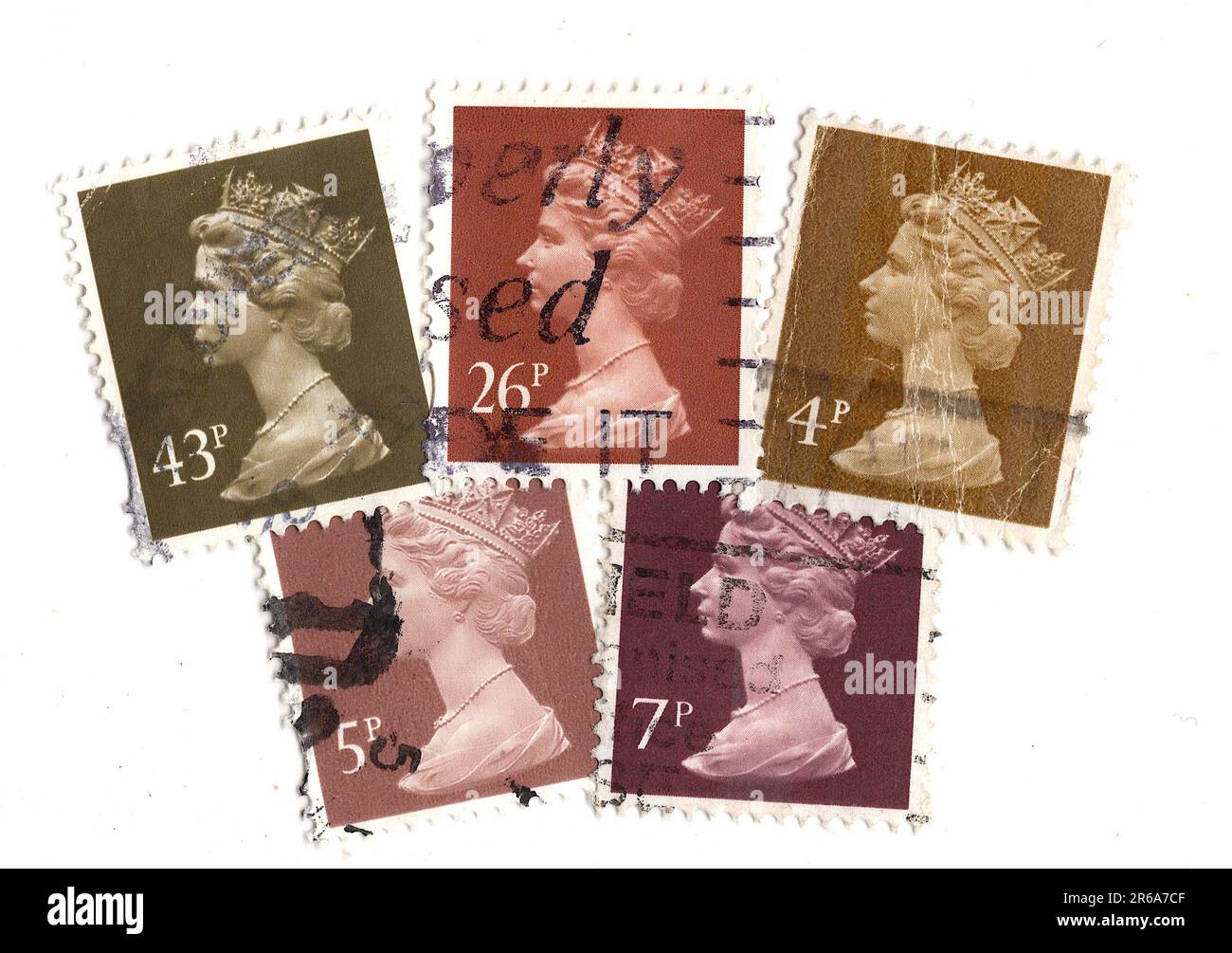 A montage of brown vintage postage stamps from the United Kingdom ...