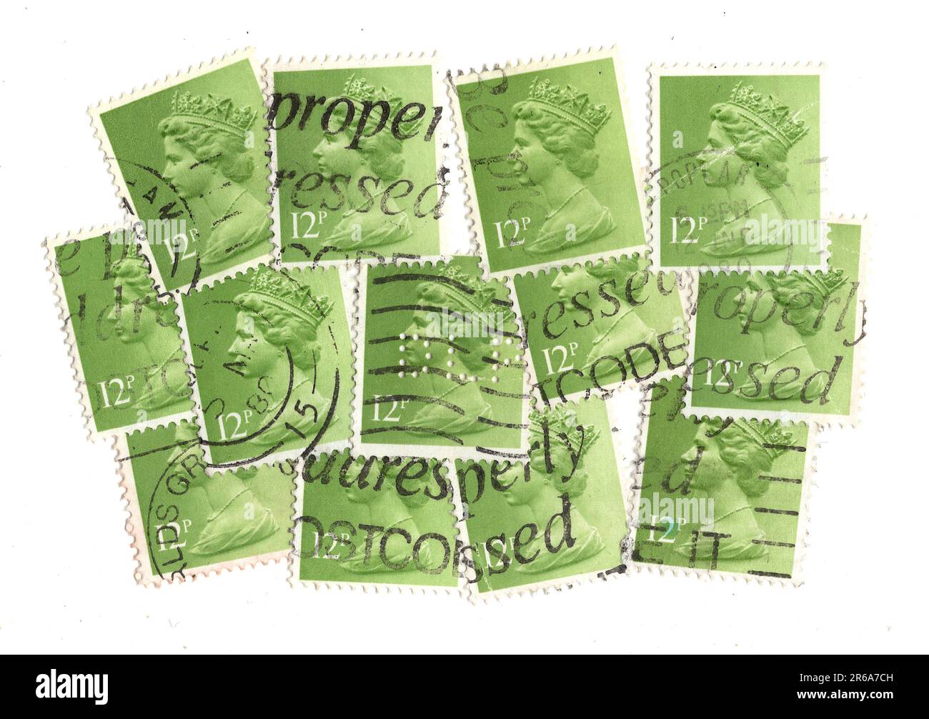 A montage of green 12p vintage postage stamps from the United Kingdom ...