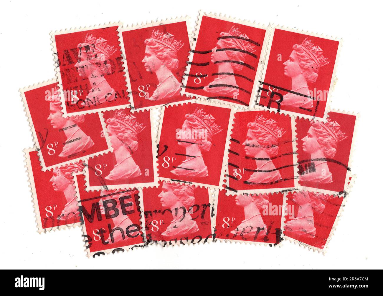 A montage of red 8p vintage postage stamps from the United Kingdom ...
