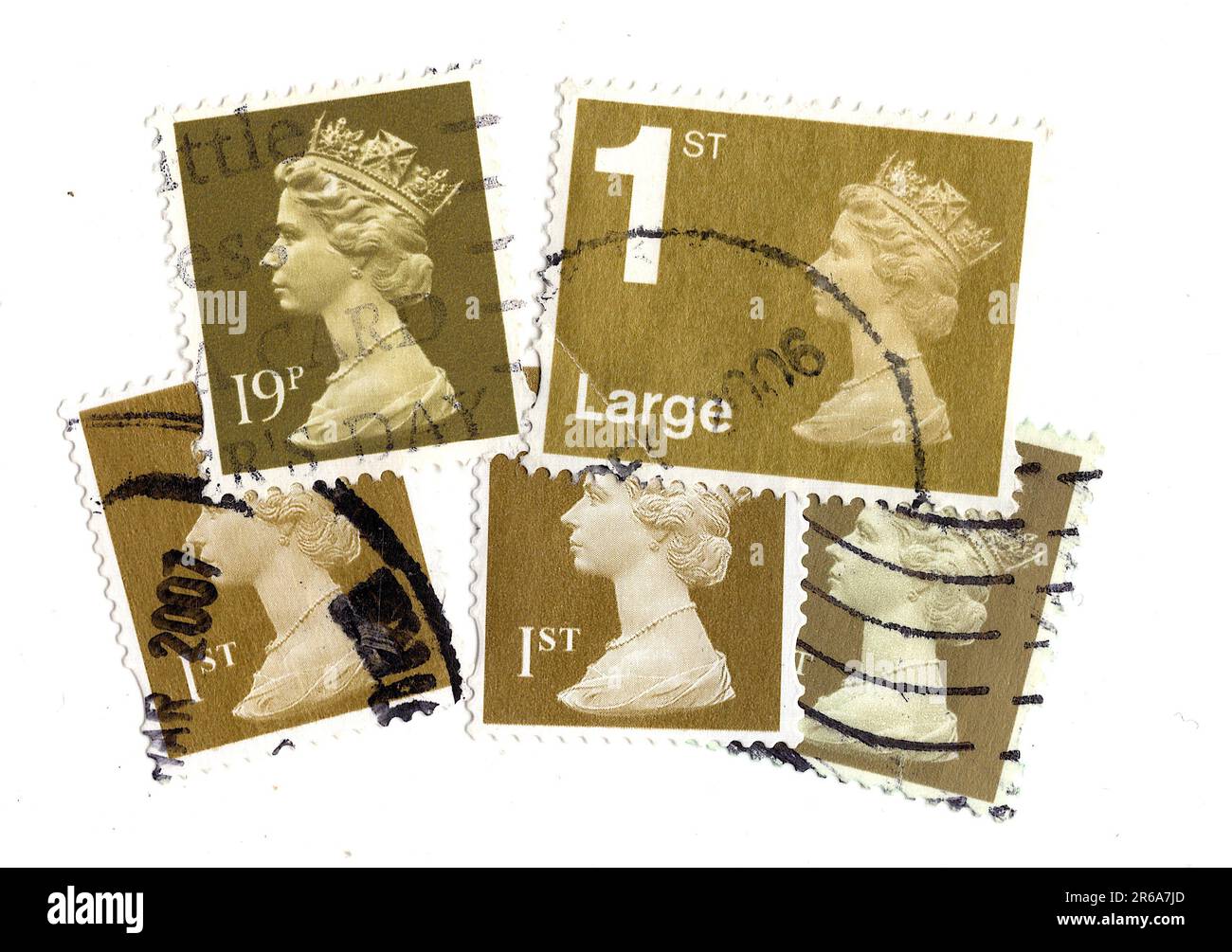 A montage of gold vintage postage stamps from the United Kingdom ...