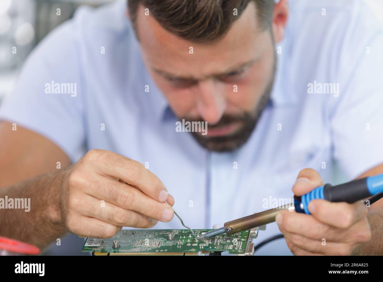 Technician testing circuit in hi-res stock photography and images - Alamy