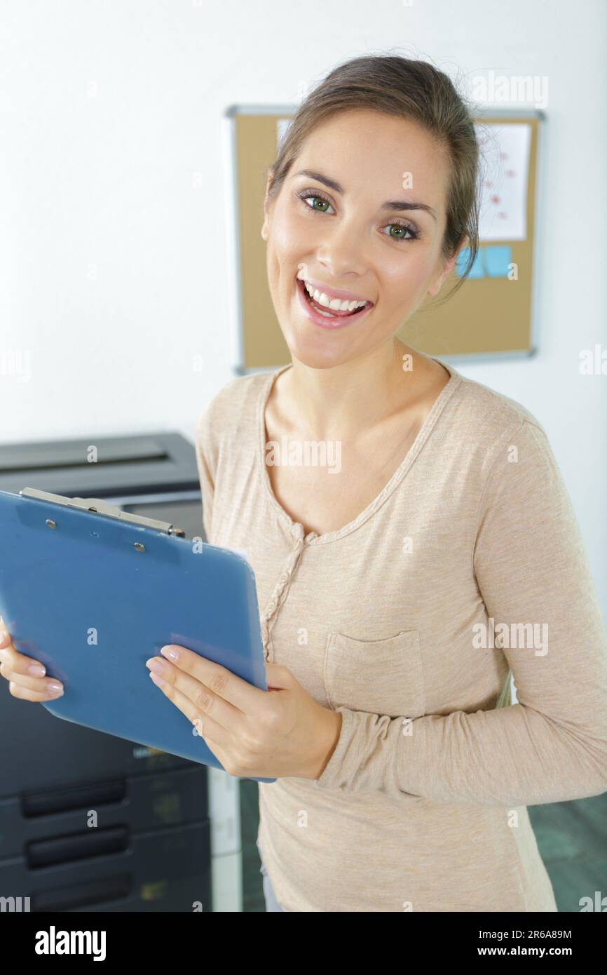 happy office worker looking at camera Stock Photo - Alamy