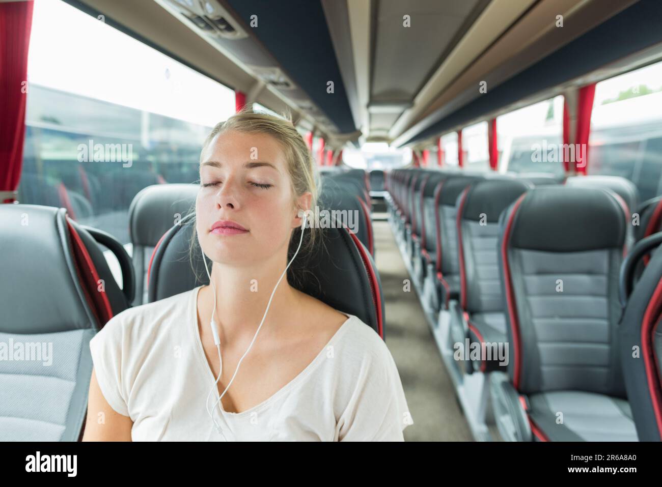 young beautiful woman sleeping in the bus Stock Photo - Alamy