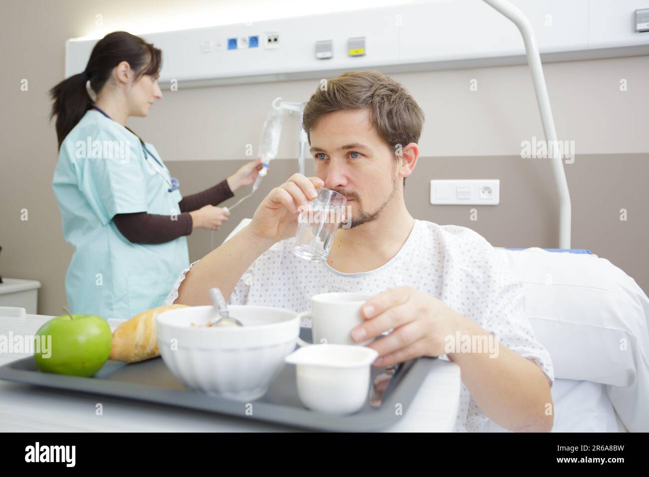 young man patient eating breakfast in hospital Stock Photo - Alamy