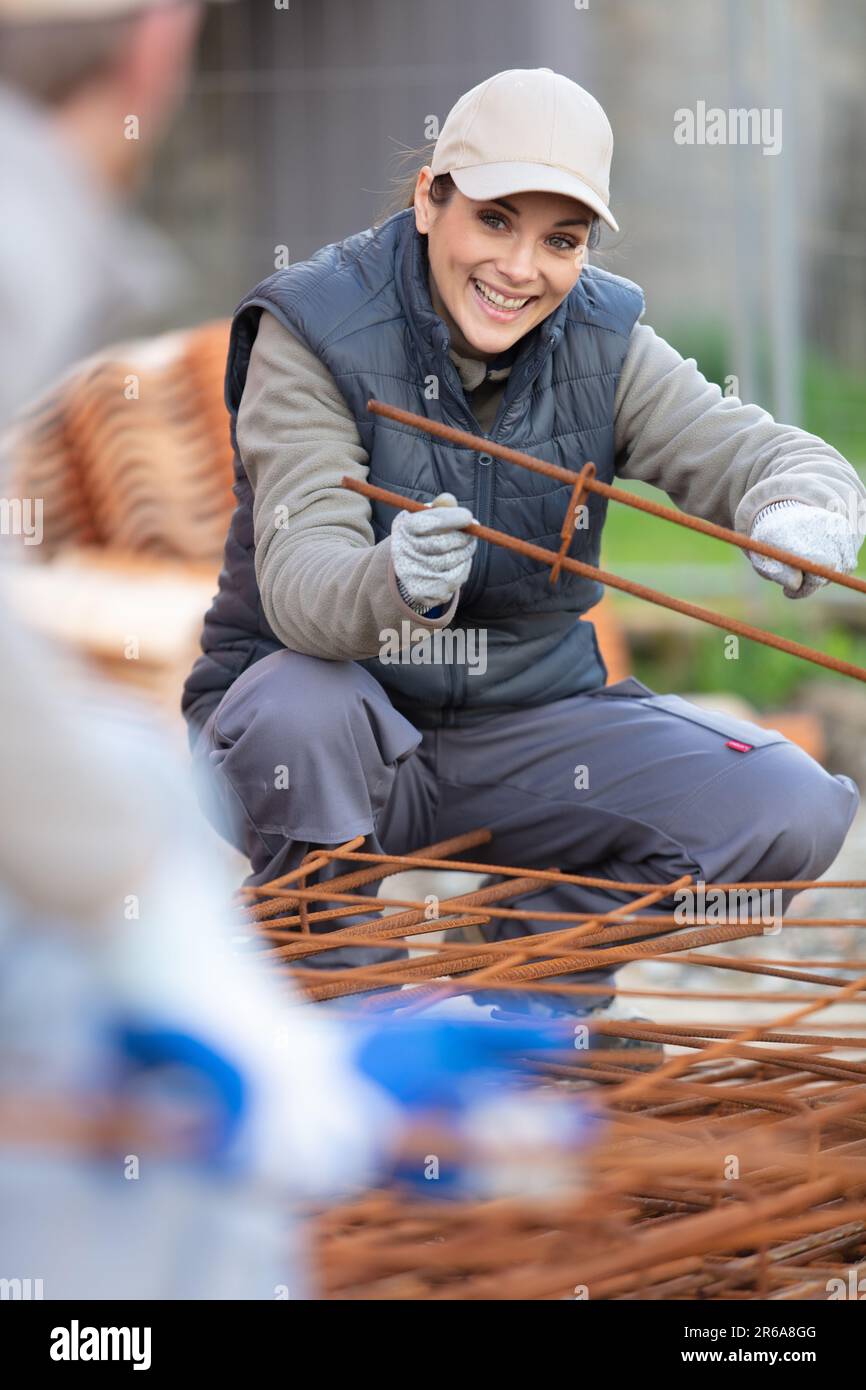 worker fixing steel rebar at building site Stock Photo - Alamy