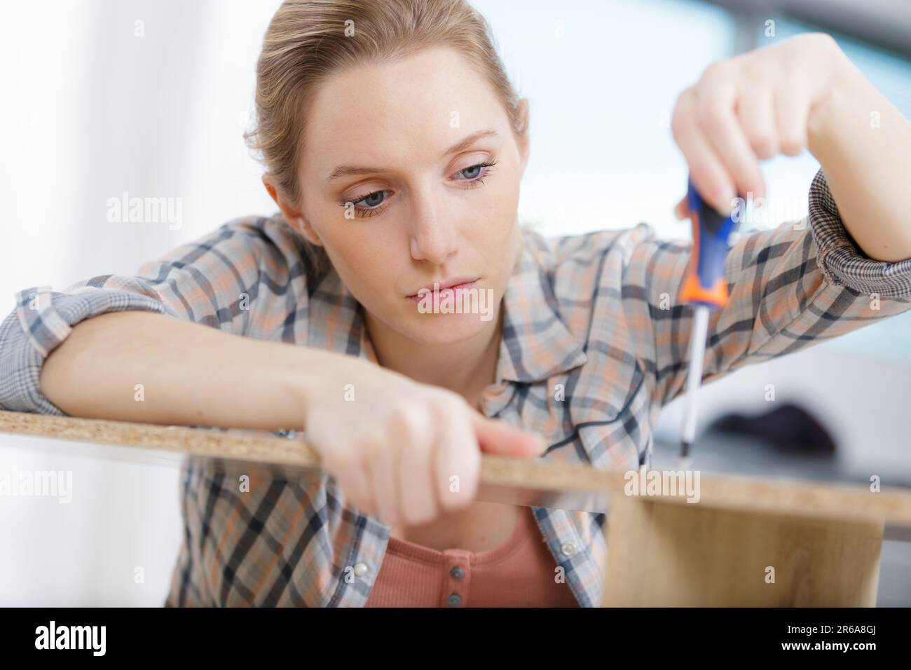 Screwing fastening hi-res stock photography and images - Alamy