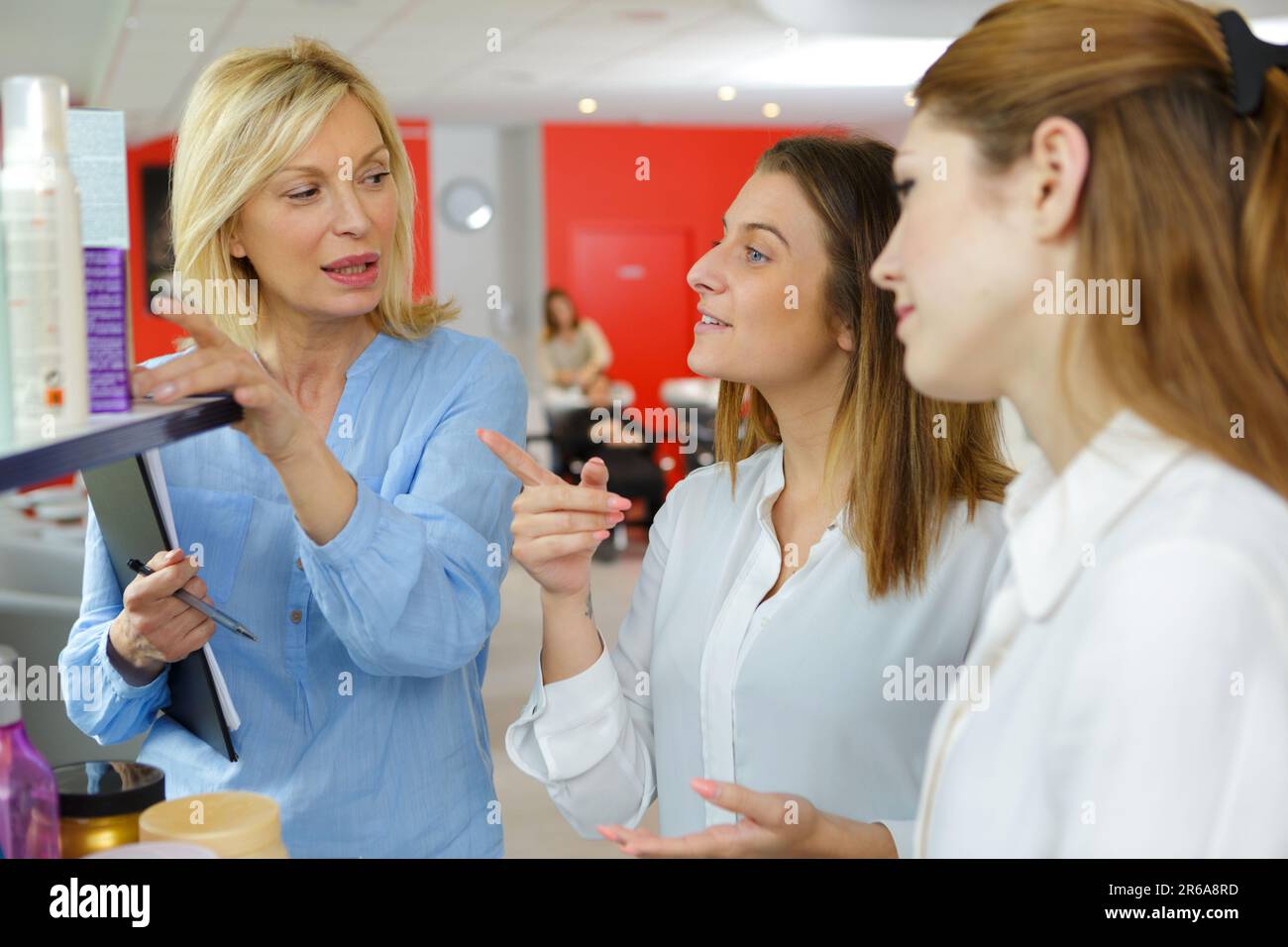 women choosing something Stock Photo - Alamy