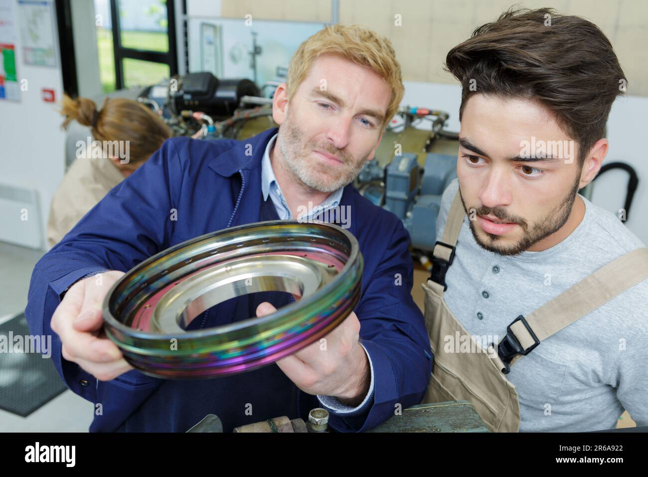 young workers working in factory Stock Photo - Alamy