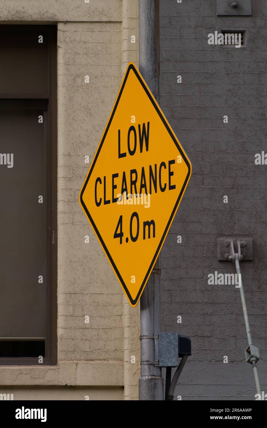 Australian low clearance sign showing information for road users, black ...