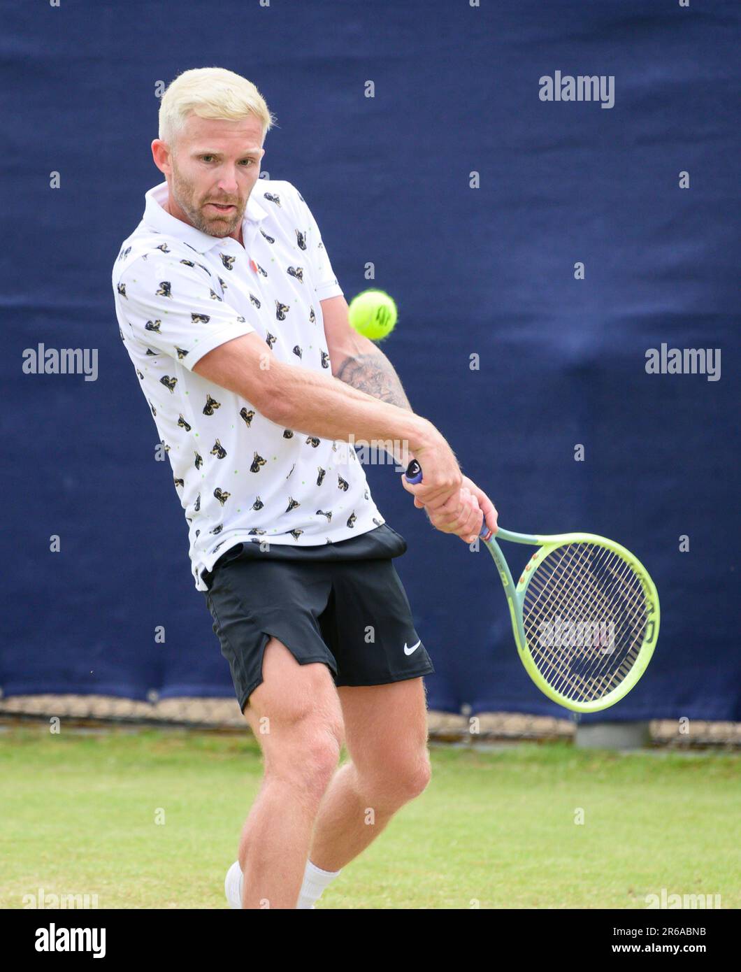 Daniel Cox (GBR) playing in the first round at the Surbiton Trophy ...