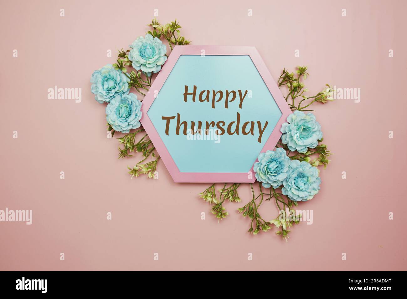 Happy Thursday typography text decorate with flower on pink background ...