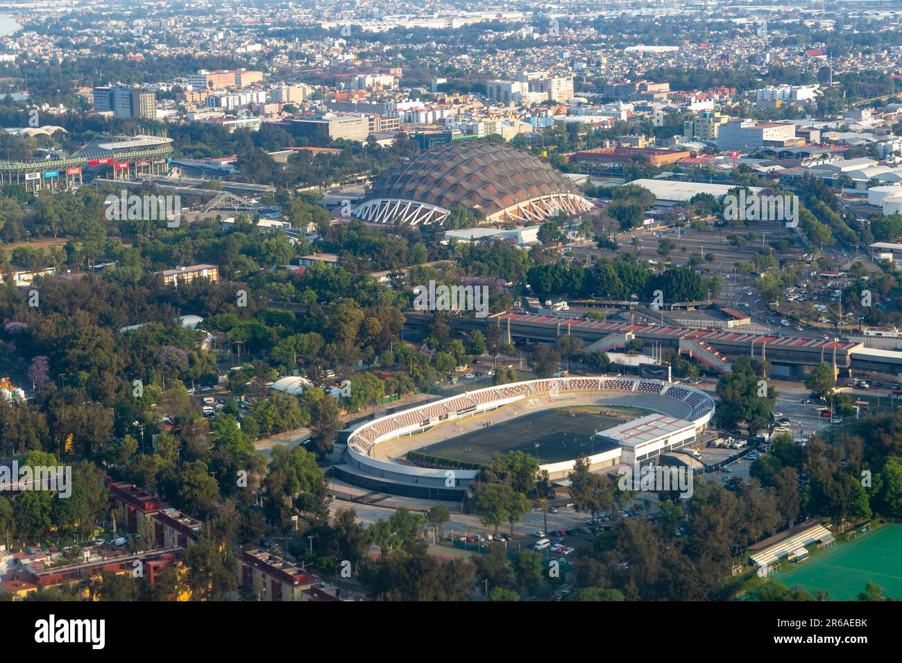Oblique angle aerial view through plane window over Mexico City, Mexico ...