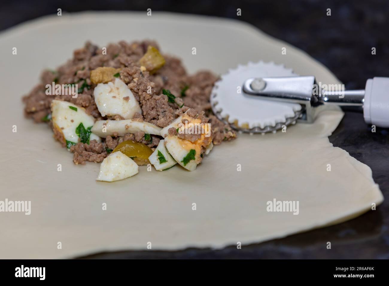 Traditional homemade rustic Brazilian pastry stuffed with ground meat ...