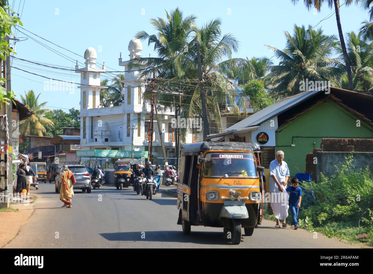 December 29 2022 - Kannur district, Kerala in India: Indian Traffic on dusty streets Stock Photo ...