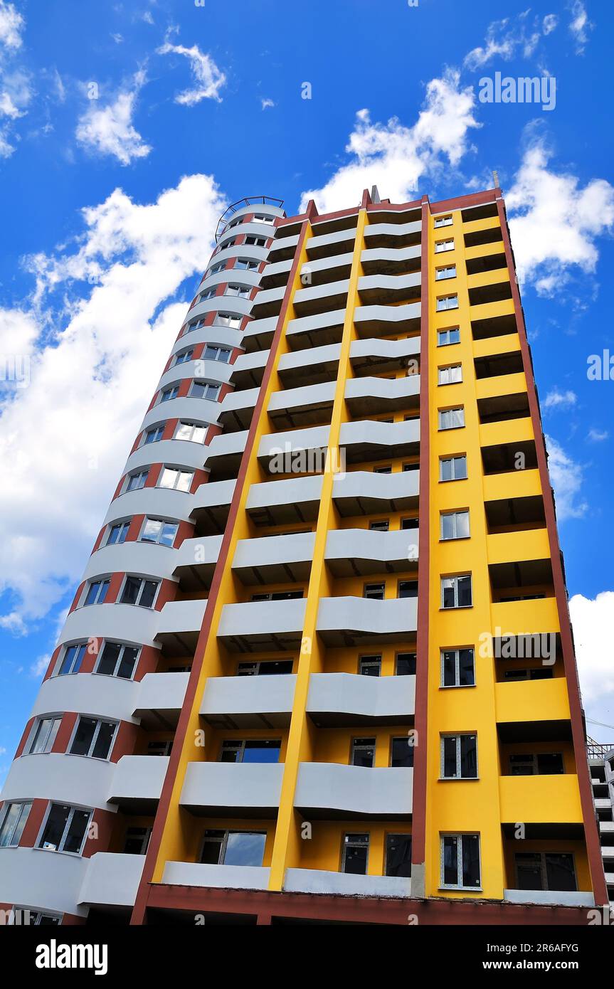 New multi-storey building on a sky background Stock Photo - Alamy