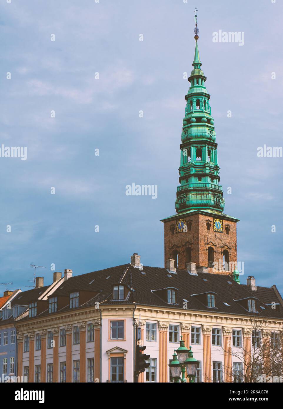 clock tower behind buildings Stock Photo - Alamy