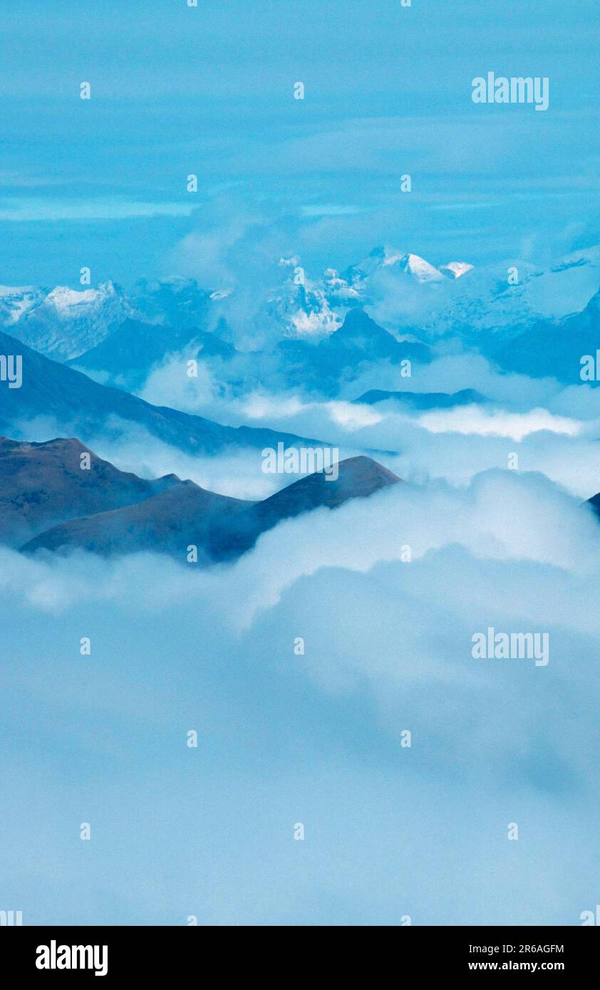 Alpine peaks above the clouds, Bernese Oberland (overview) (Europe ...