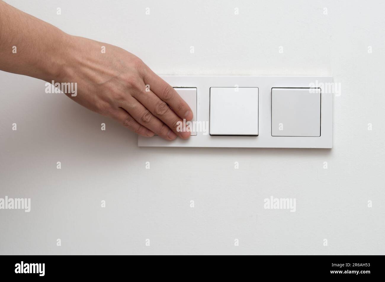 Womans hand light switch hi-res stock photography and images - Alamy