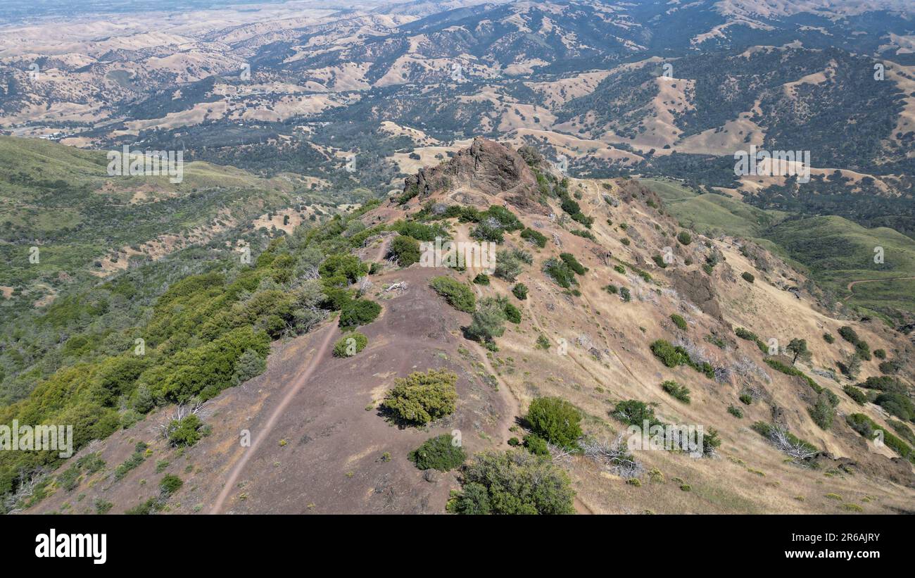 An elevated bird's eye view of a picturesque mountain valley surrounded ...