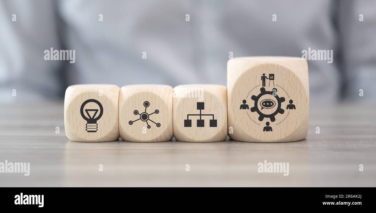 Wooden blocks with symbol of workshop concept Stock Photo - Alamy