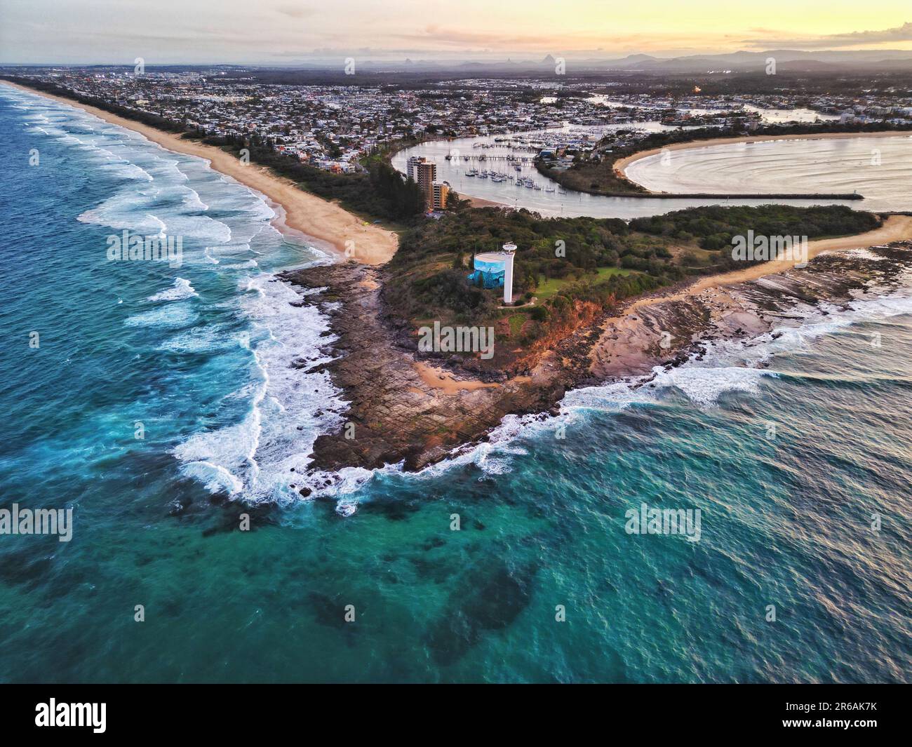An Aerial view of Point Cartwright Lighthouse on the Sunshine Coast of ...