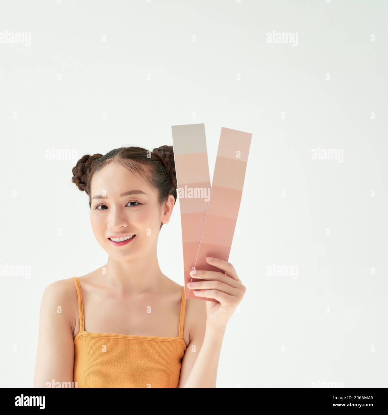 woman take skin color scale on the white background Stock Photo - Alamy