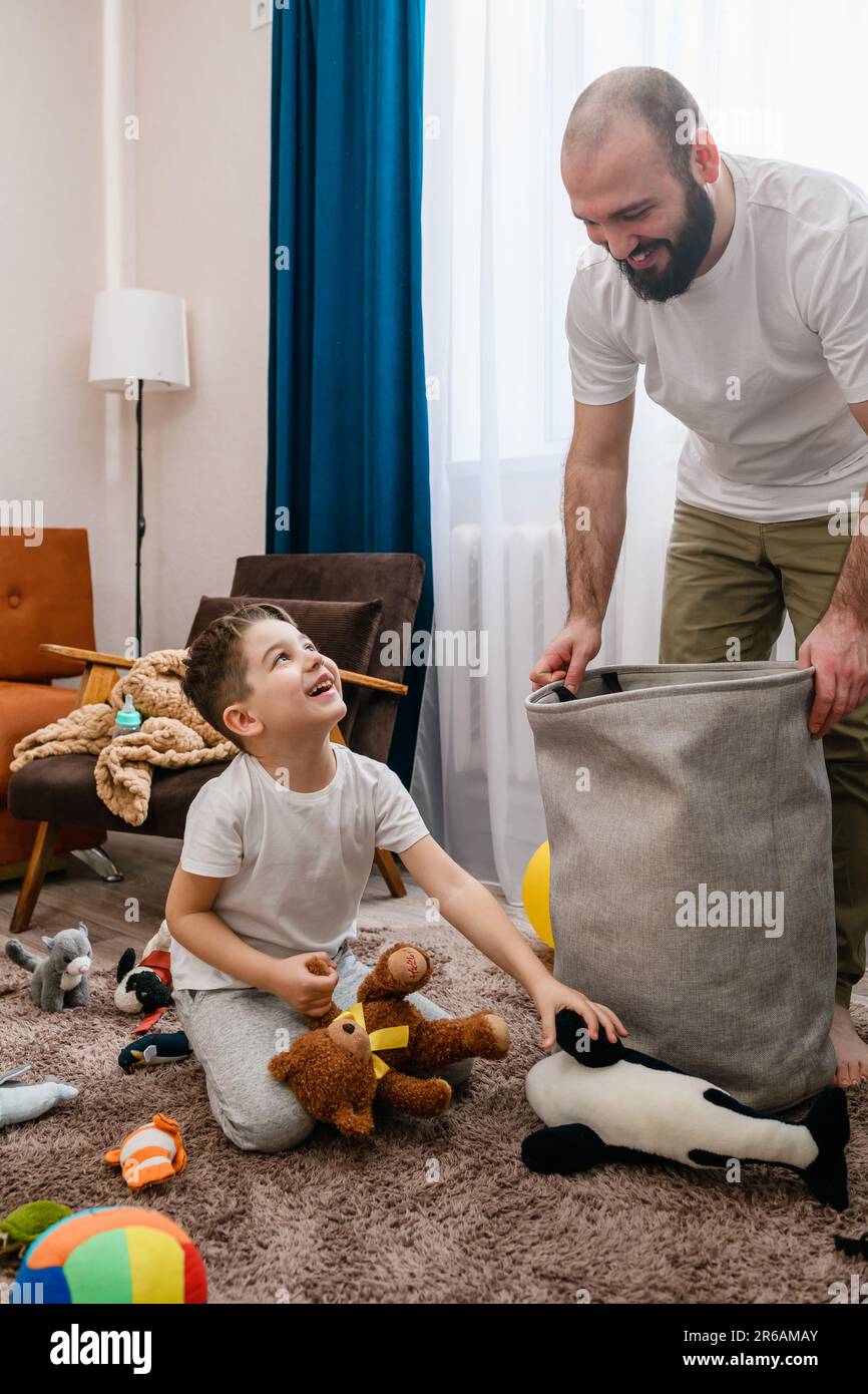 Cleaning up toys hi-res stock photography and images - Alamy