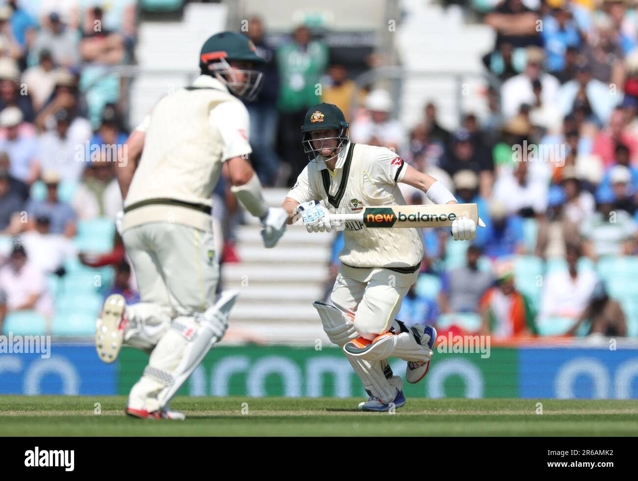 Australia's Steve Smith (right) and Travis Head in action during day ...