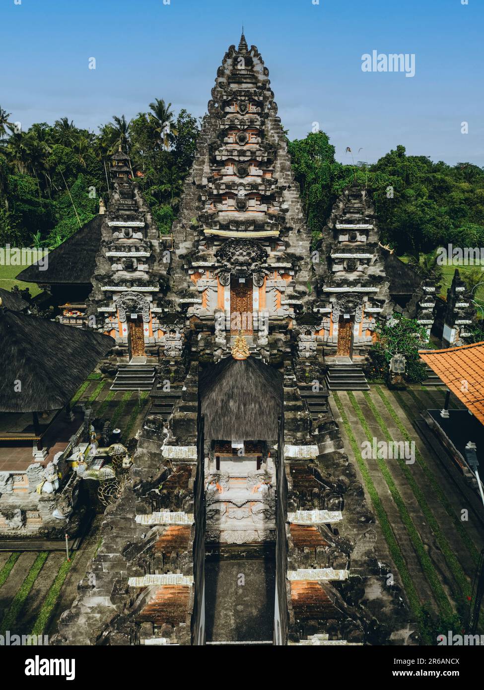 Aerial view of beautiful complex traditional Hinduism stone balinese temple. Holy asian pura ...