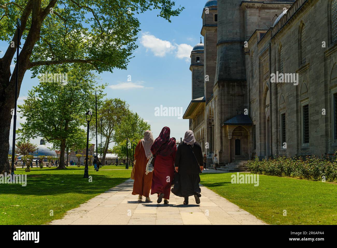 Muslim women with veil walk together outside a mosque in Istanbul on a ...