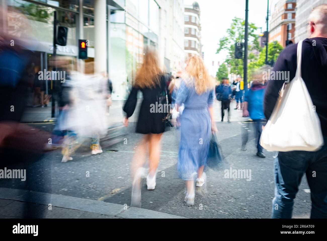 Motion blurred London retail high street scene Stock Photo - Alamy