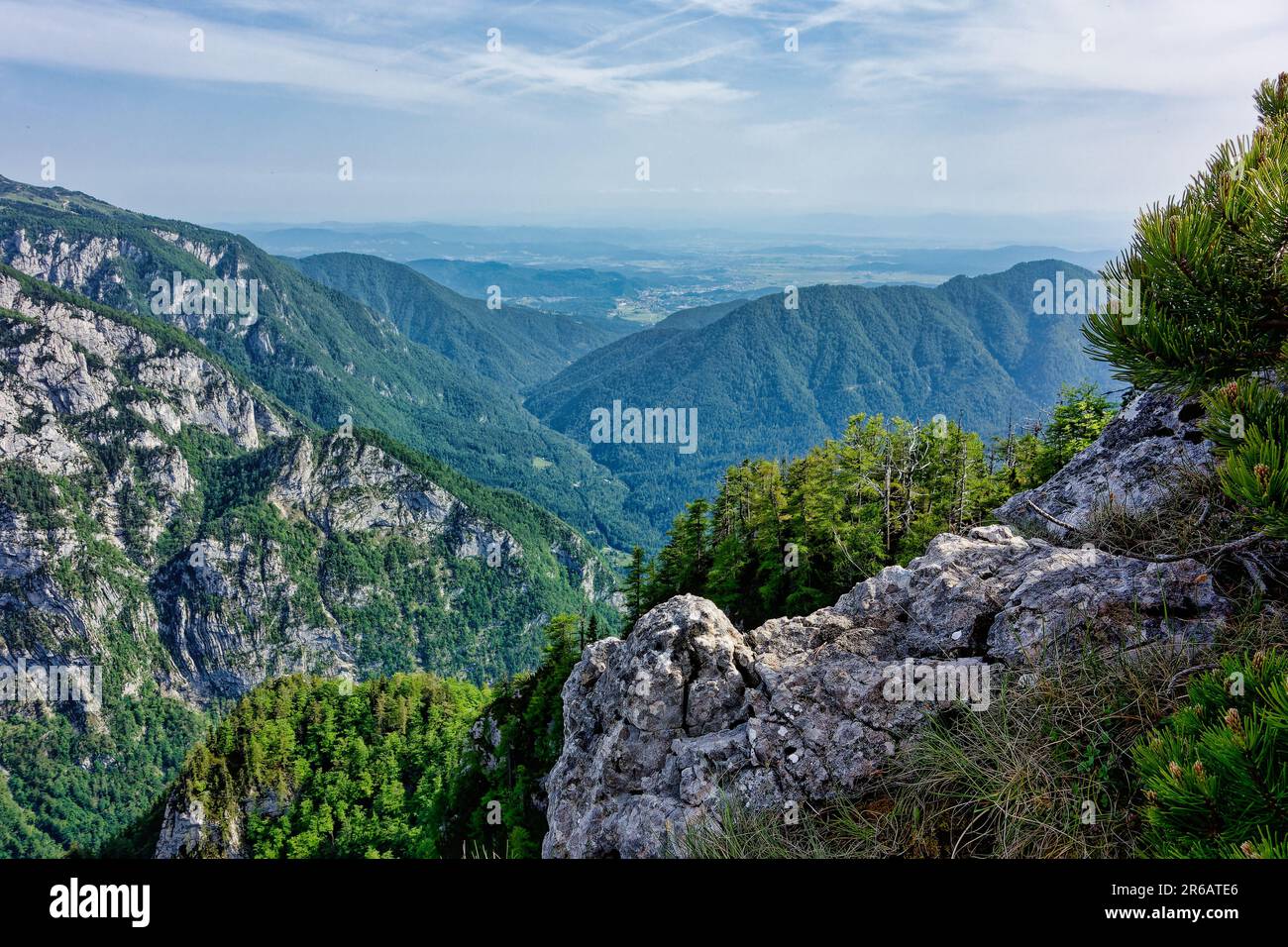 A breathtaking landscape of a scenic valley surrounded by majestic ...
