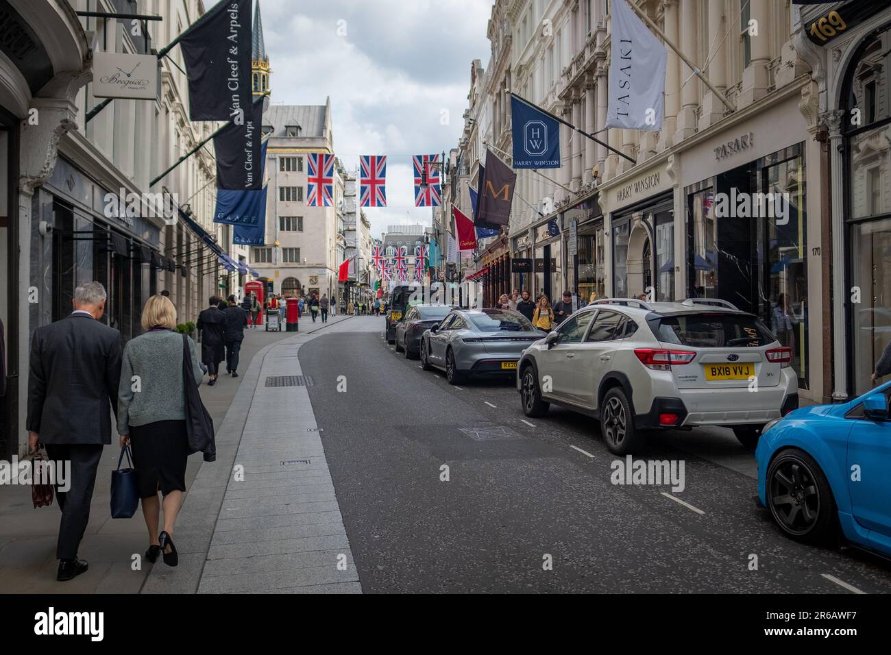 London- May 2023: Shoppers on Bond Street, a landmark high street and ...