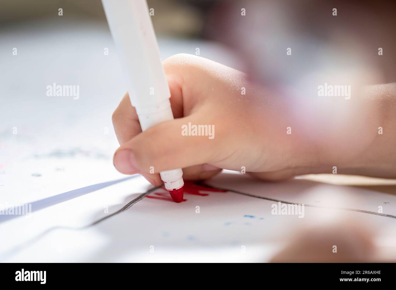 Happy children drawing in classroom hi-res stock photography and images ...
