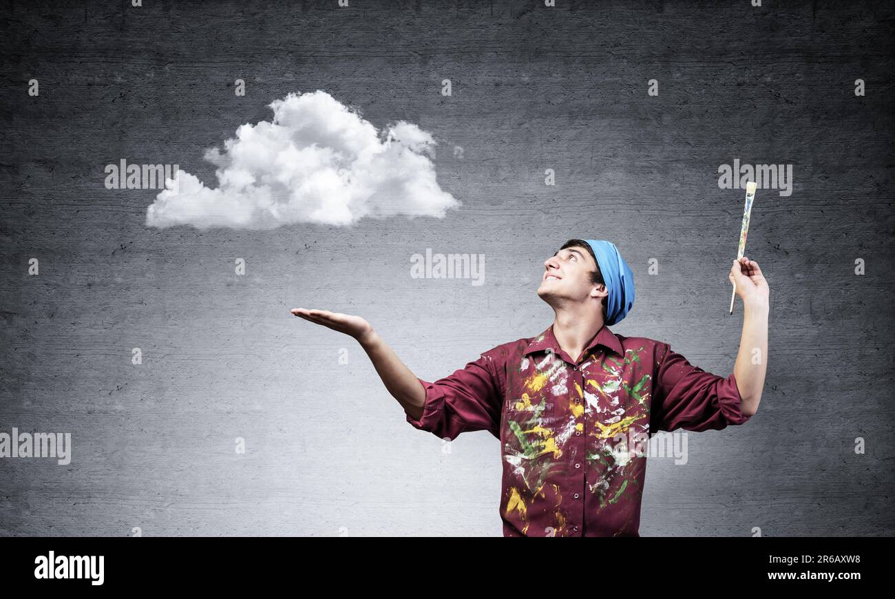 Young artist drawing realistic white cloud Stock Photo - Alamy