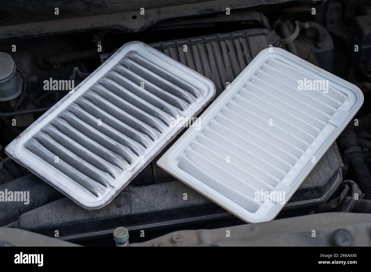 Used and new car engine air filters. Car maintenance Stock Photo - Alamy