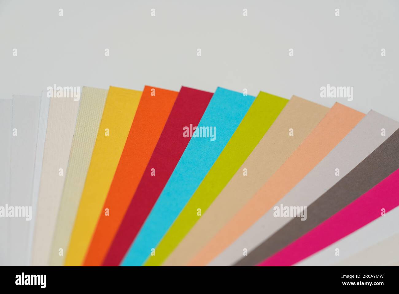 Colourful paper swatches on white desk, closeup detail Stock Photo - Alamy