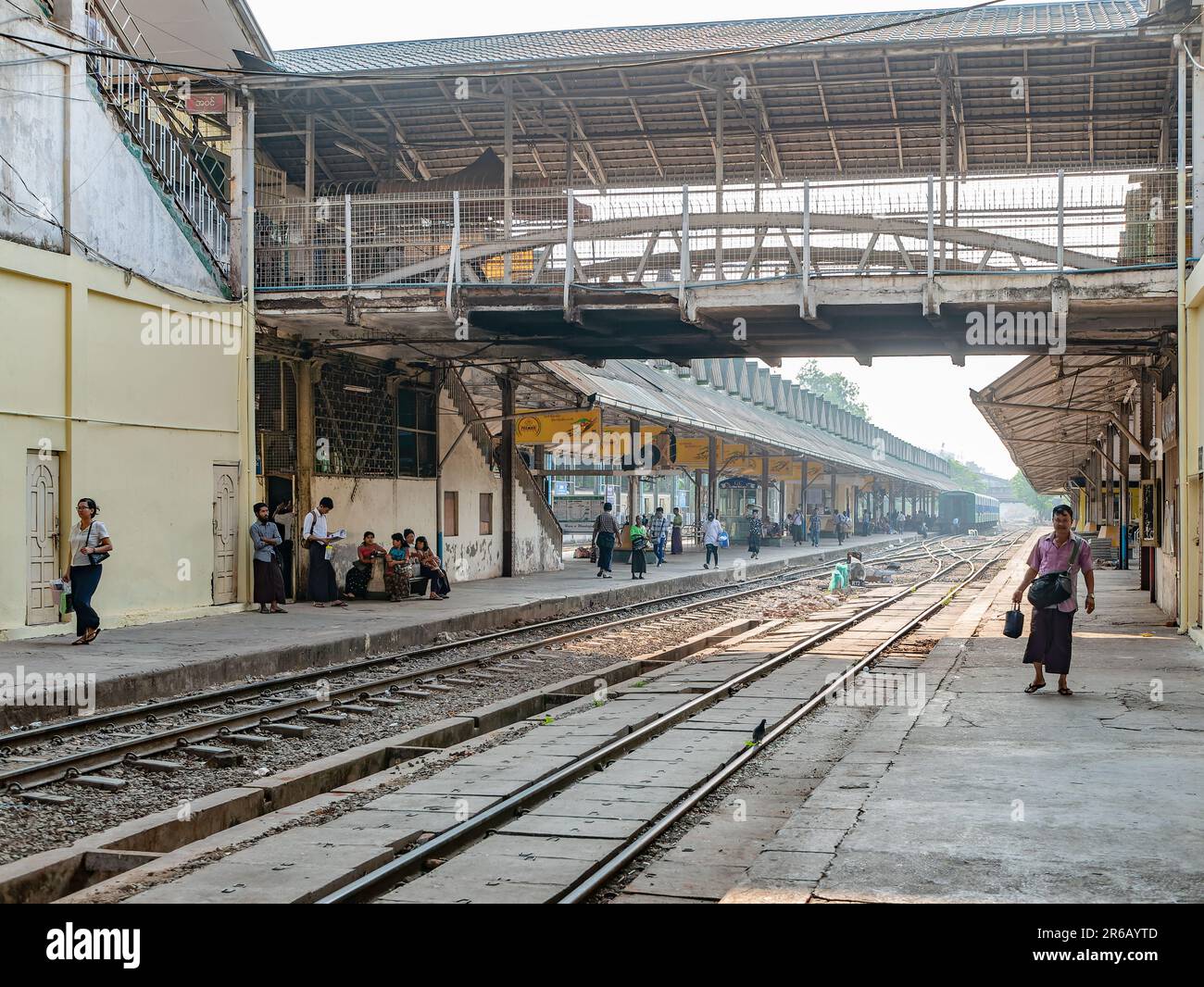 Passengers waiting for their trains at Yangon Central, the main railway ...