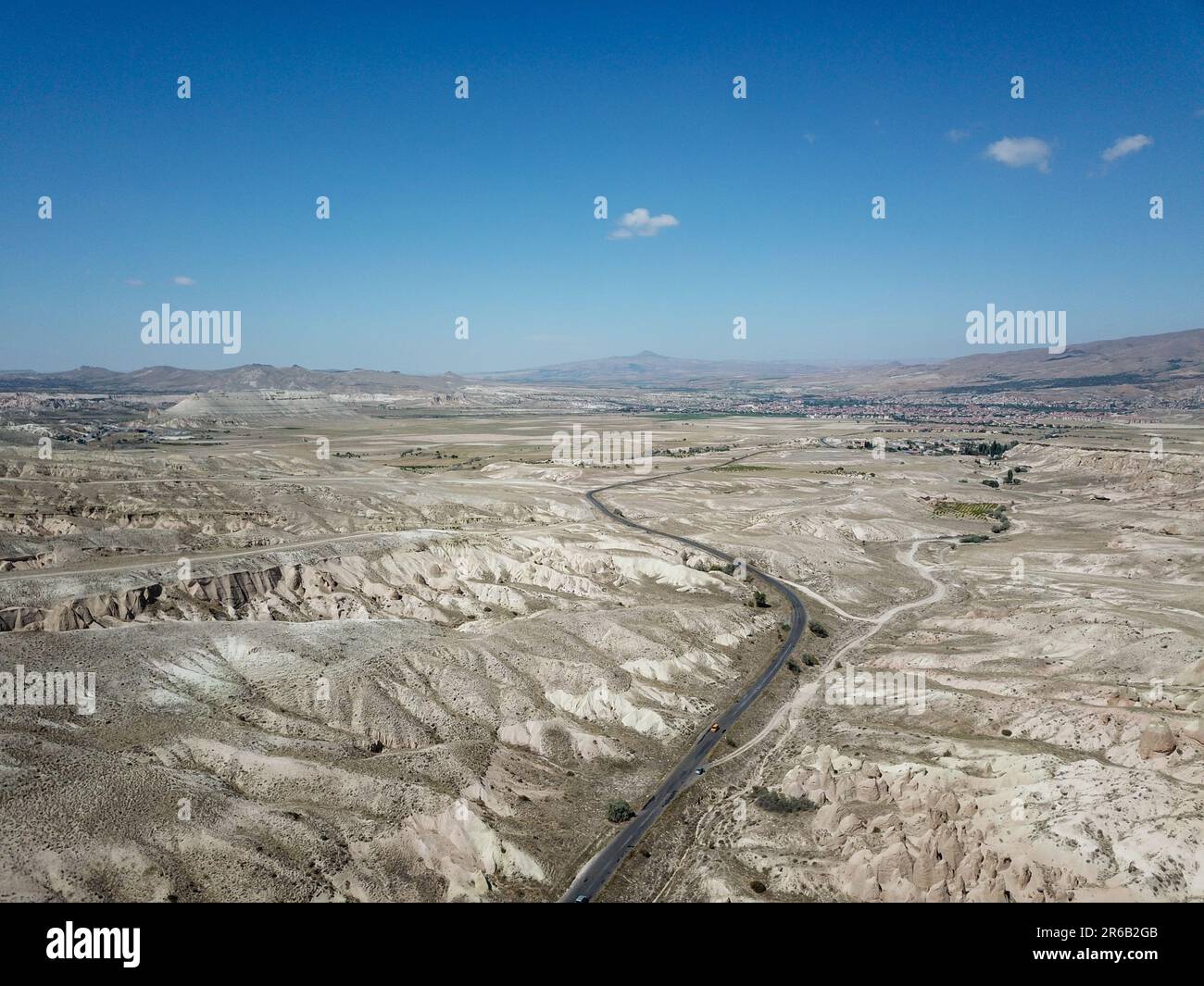 A scenic view of a desert landscape in Cappadocia, Turkey Stock Photo ...