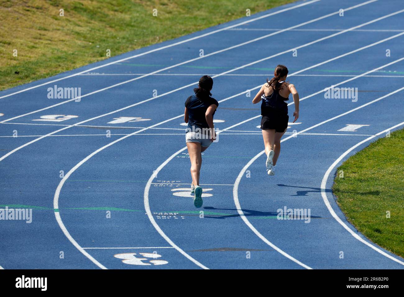 Two people running hi-res stock photography and images - Alamy