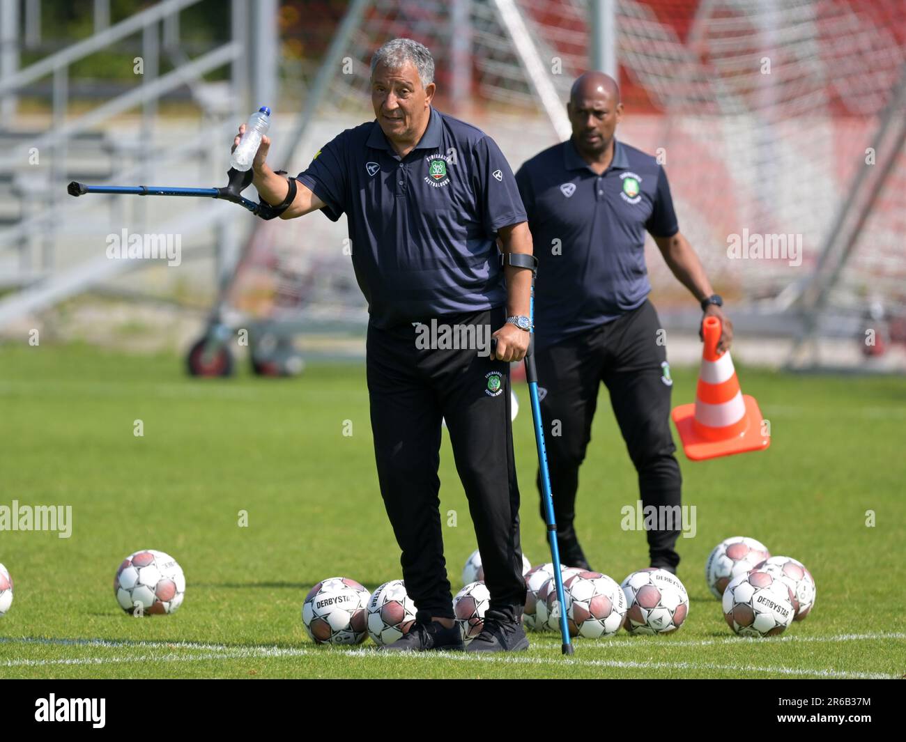 AMSTERDAM - 08/06/2023, (lr) Suriname assistant trainer coach Henk ten ...