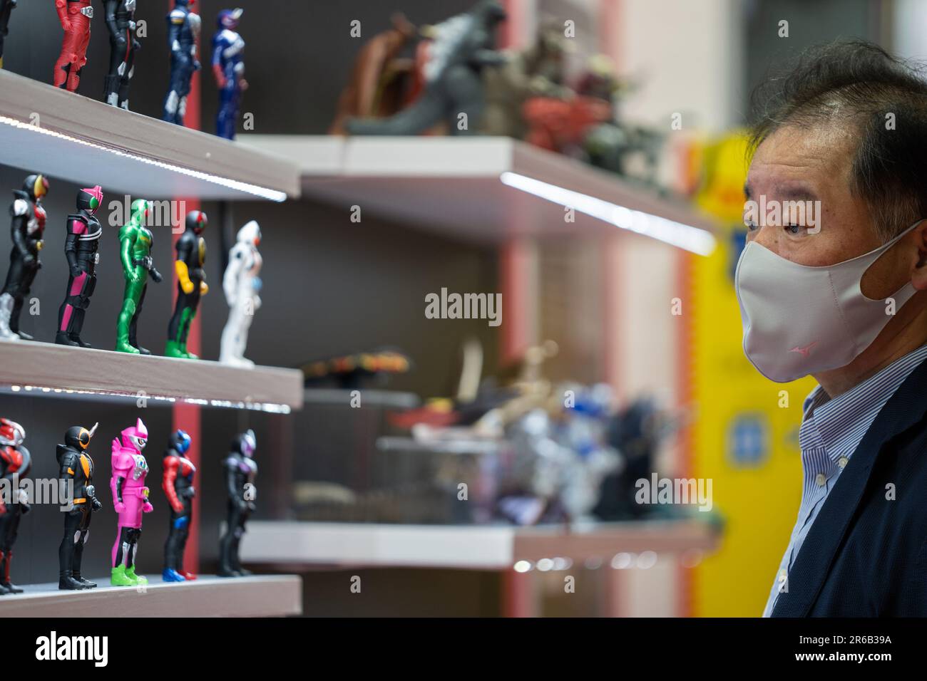 Tokyo, Japan. 8th June, 2023. A visitor looks at toys exhibited at the ...
