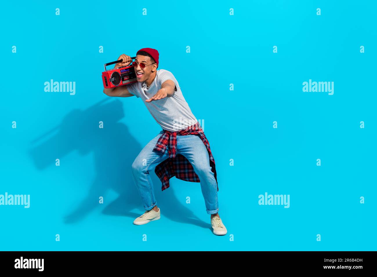 Full body portrait of positive person carry boombox dancing rejoice ...